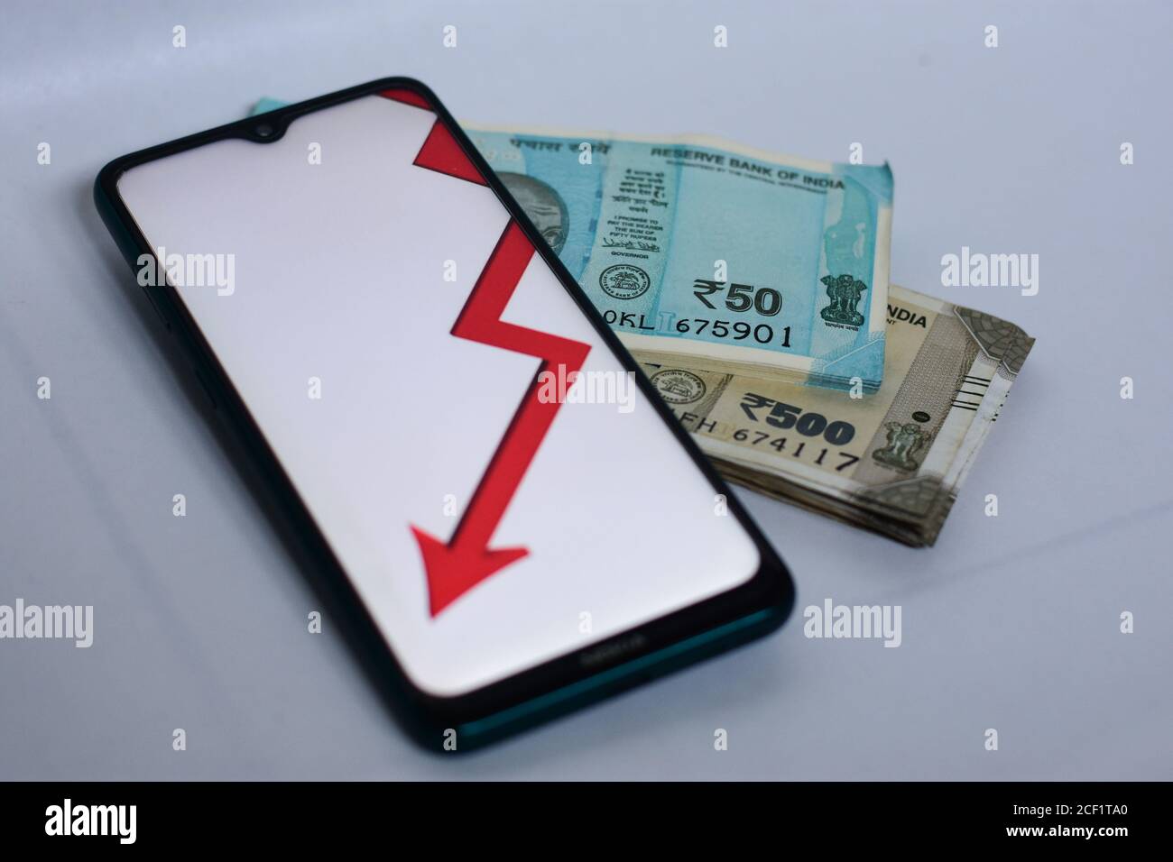 In this photo illustration five hundred and fifty rupee notes on ...