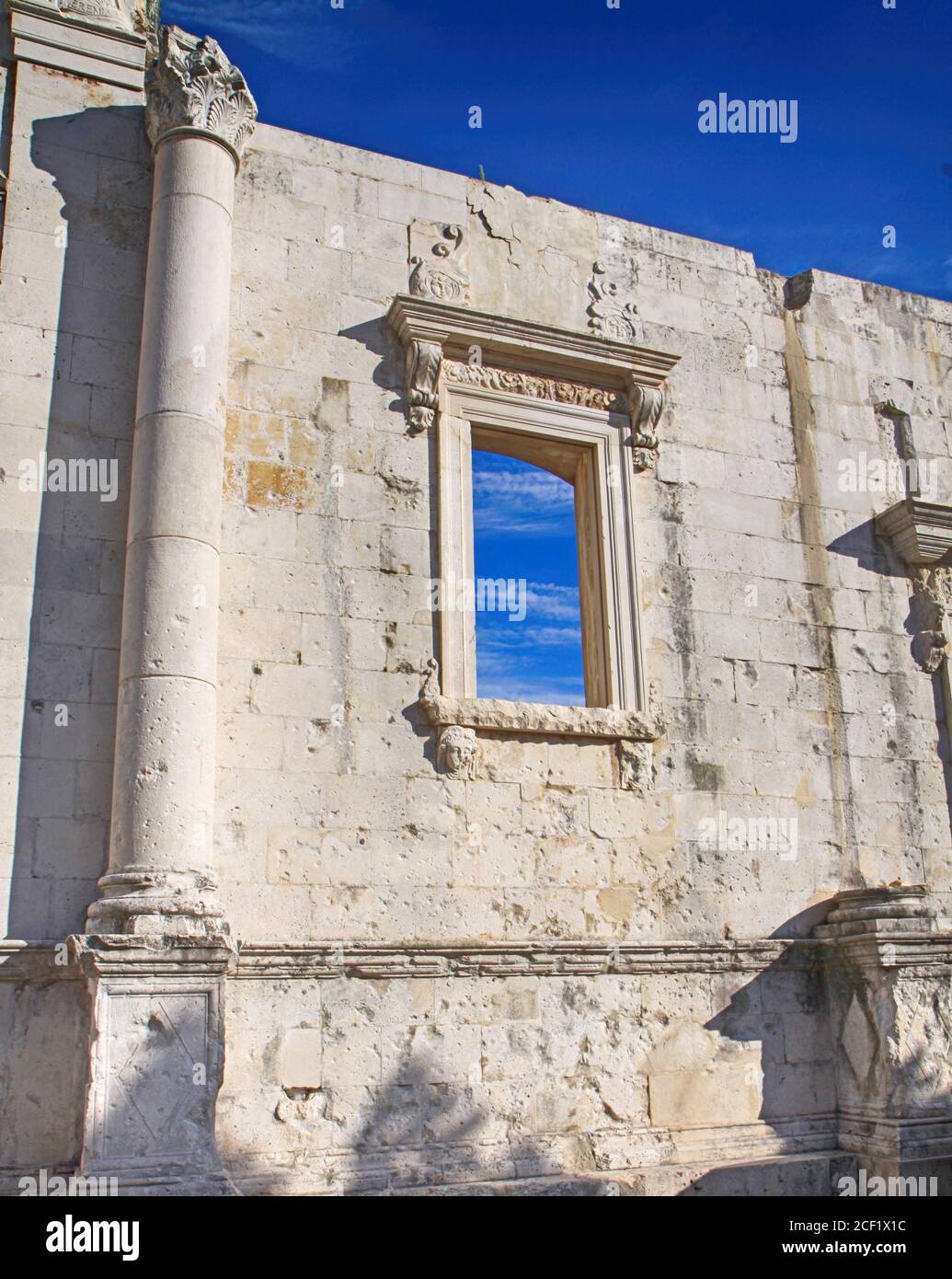 Ancient Roman ruins in Zadar, Croatia: white stone wall and decorated ...