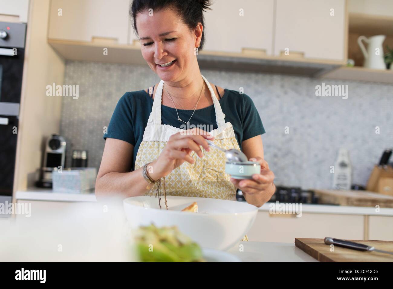 Baking brunette cook hi-res stock photography and images - Alamy