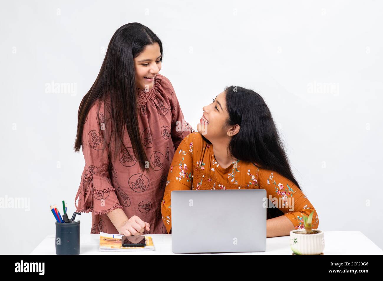 Sitting infront of computer hi-res stock photography and images - Alamy