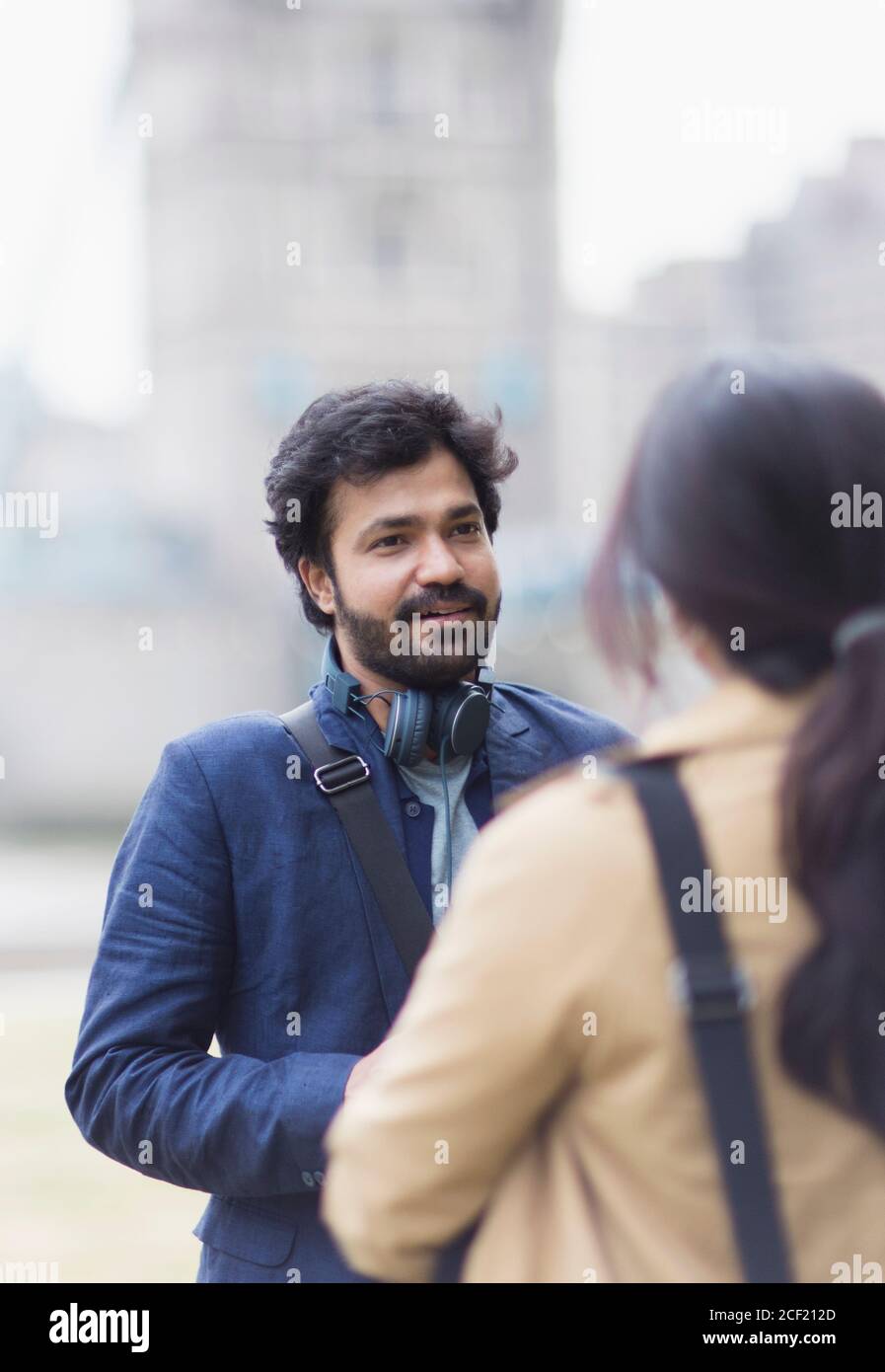 Business people talking outdoors Stock Photo - Alamy