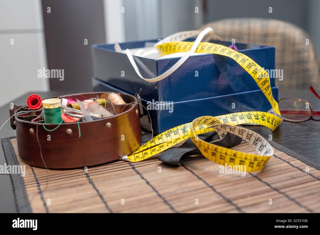 Yellow meter with other sewing instruments for tailoring work Stock ...