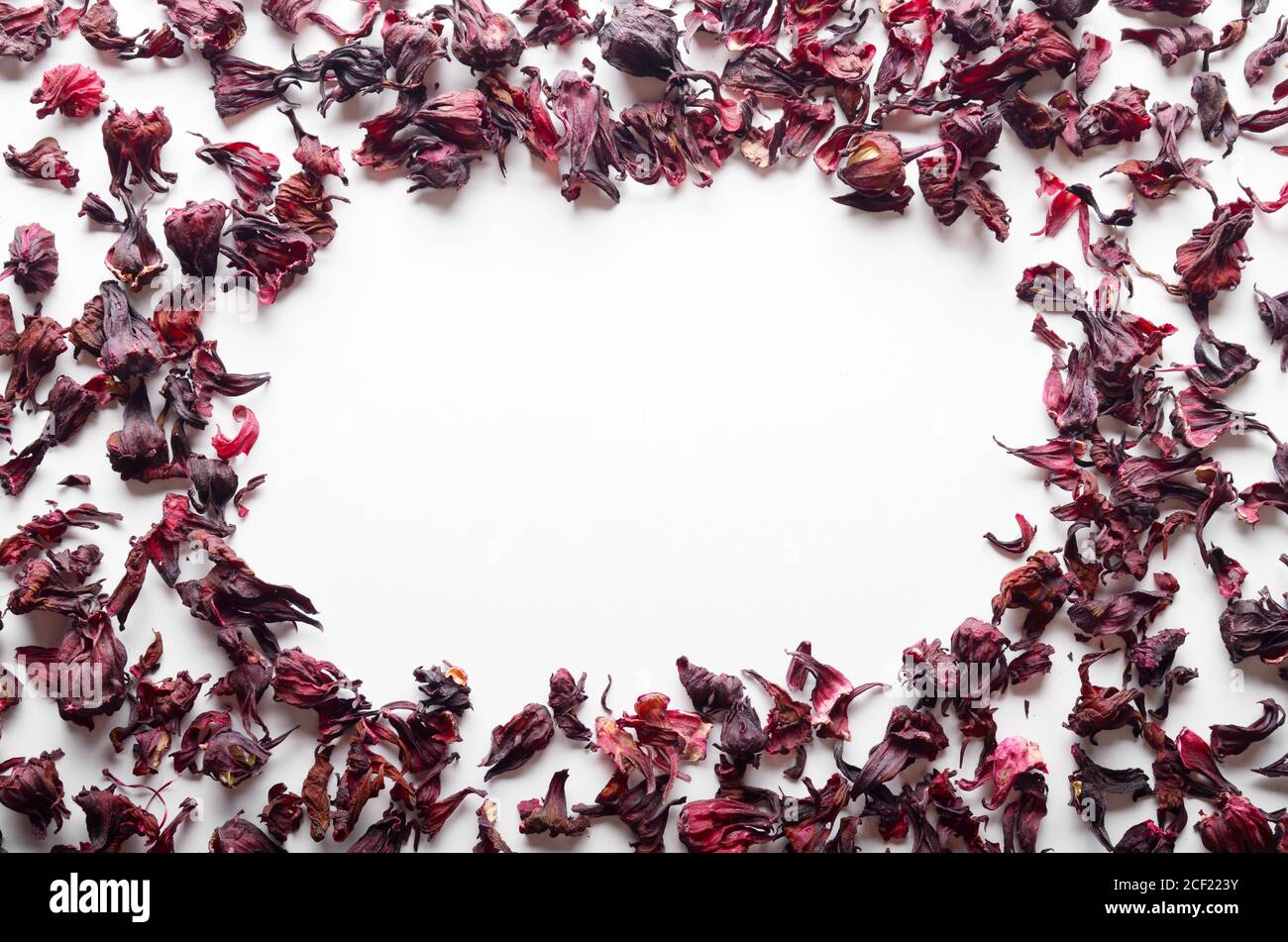 Top view of Dry Hibiscus petals frame on white background closeup Stock Photo - Alamy