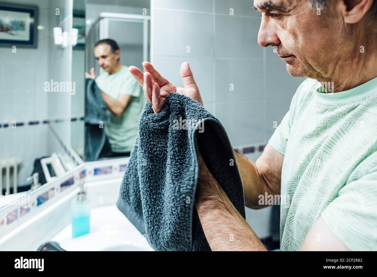 Man washing his hands liquid soap hi-res stock photography and images ...