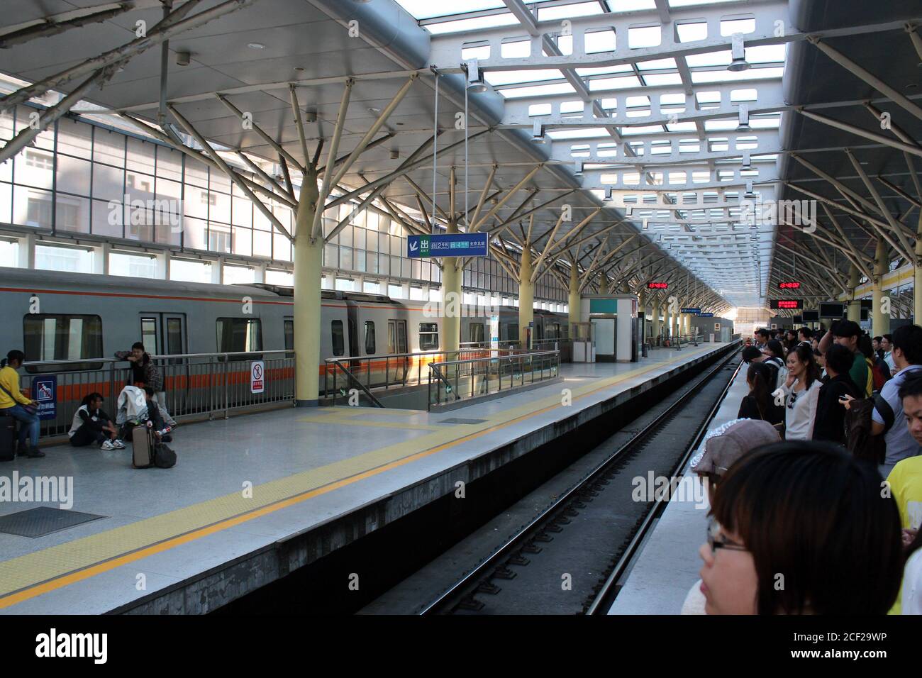 Beijing, China - 29 September 2012: Passengers waiting for subway train ...