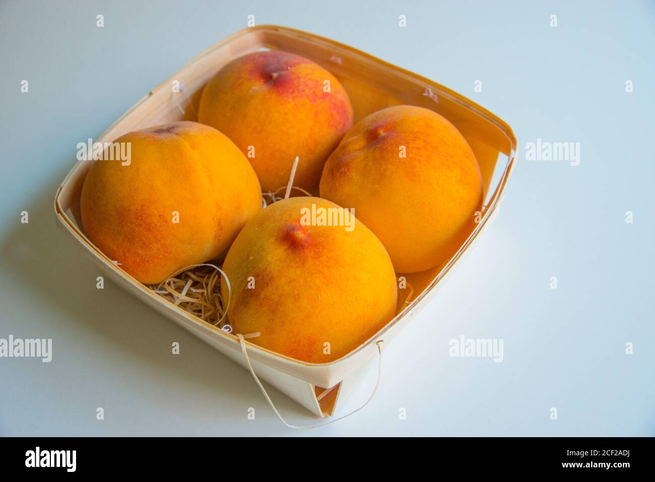 Peach basket hi-res stock photography and images - Alamy