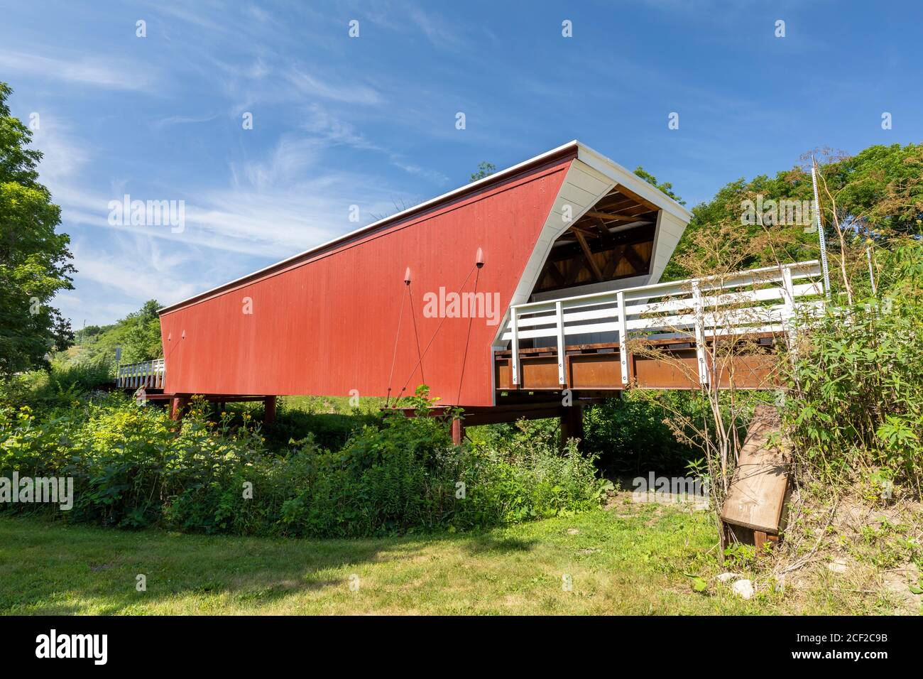 An old red and white covered bridge Stock Photo - Alamy