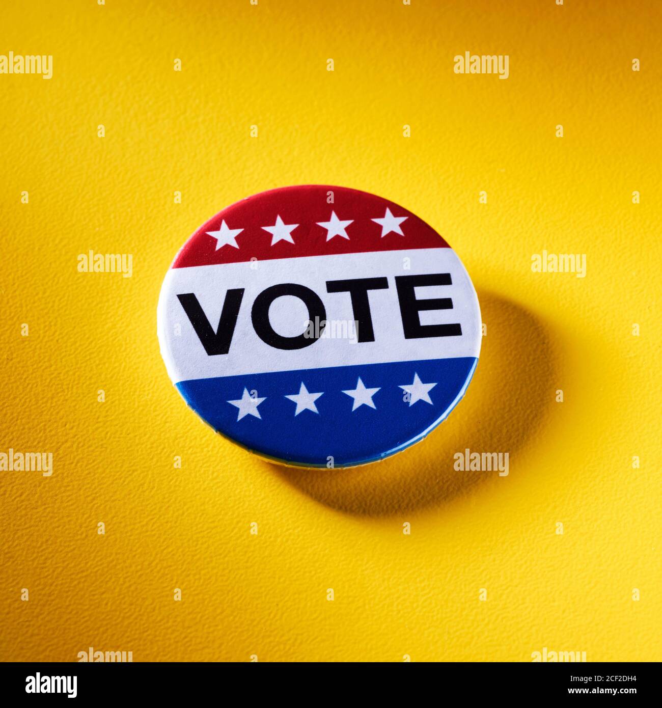 a vote badge, with the colors and the stars of the United States, on a ...