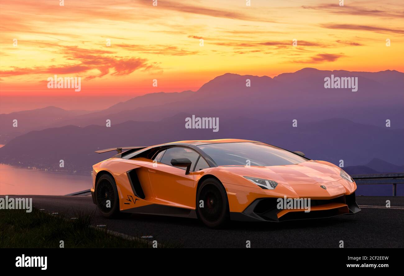 Lamborghini Aventador driving fast along a road that runs through a ...