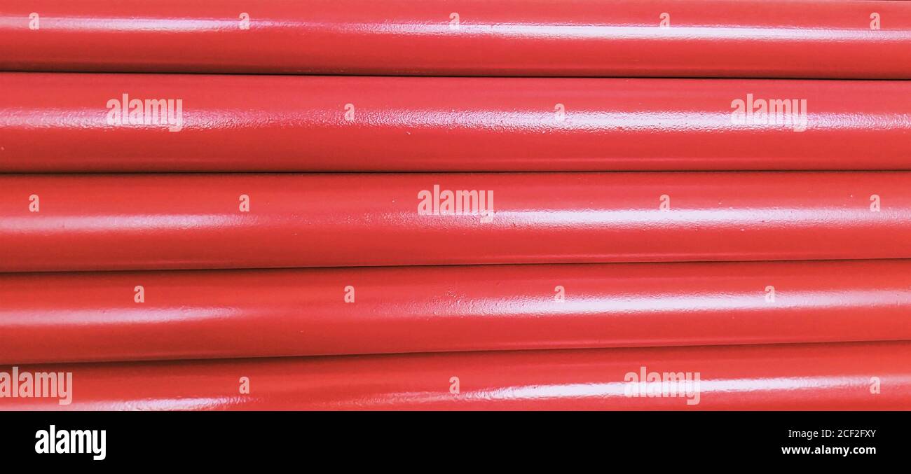 red pipes in the paintshop. fire water lines in the industrial ...