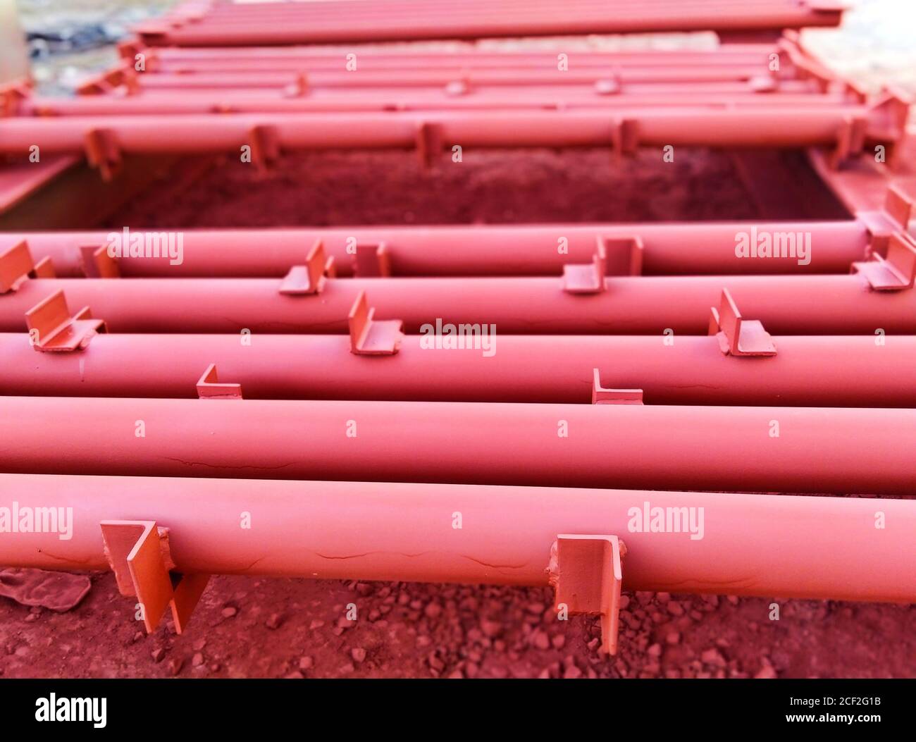red pipes in the paintshop. fire water lines in the industrial ...
