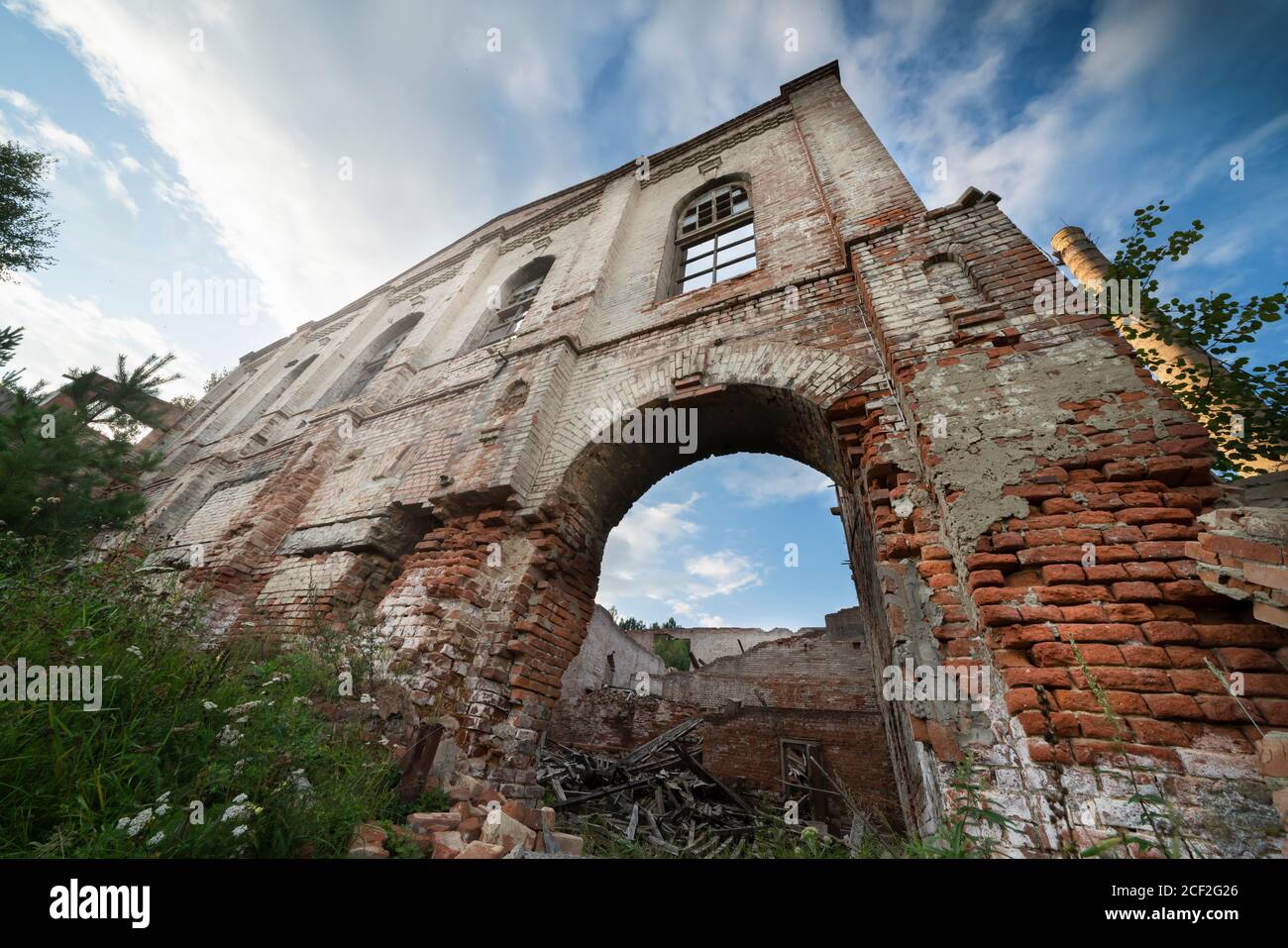 arch of an old ruined brick building against the blue sky Stock Photo ...