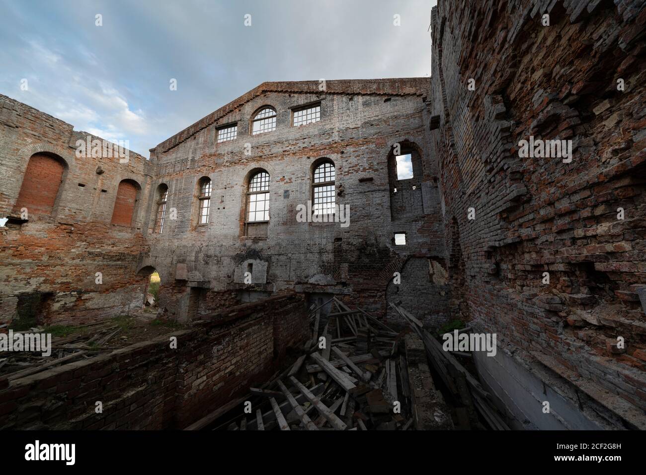 ruins of an old brick building, inside view. historical place. piles of ...