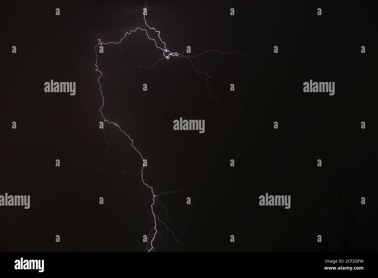 Lightning storm linear shape night Stock Photo - Alamy