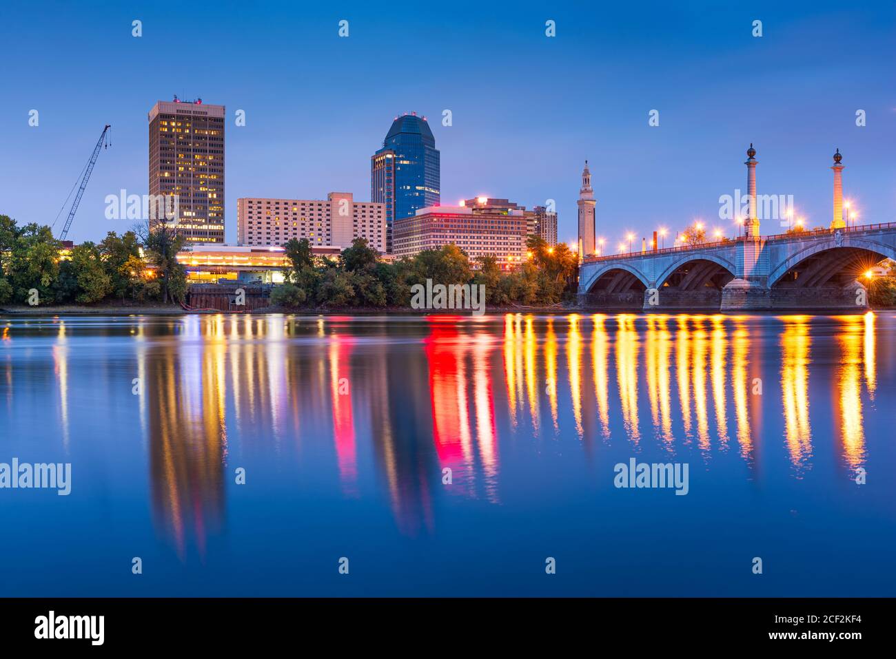 Springfield, Massachussetts, USA downtown skyline on the river at dusk ...