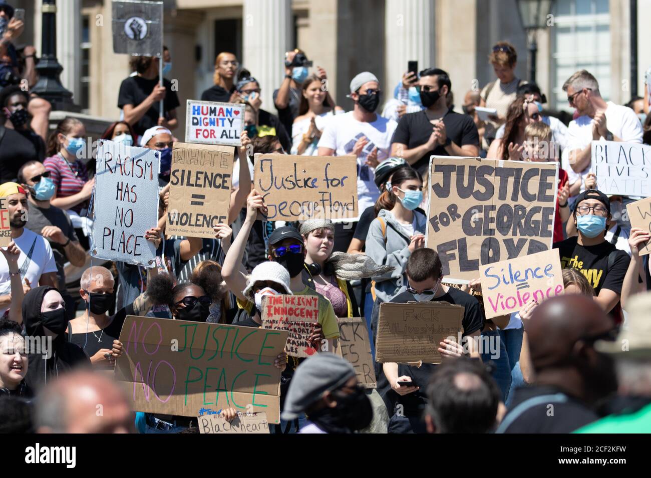 Blm protestor holding placard hi-res stock photography and images - Alamy