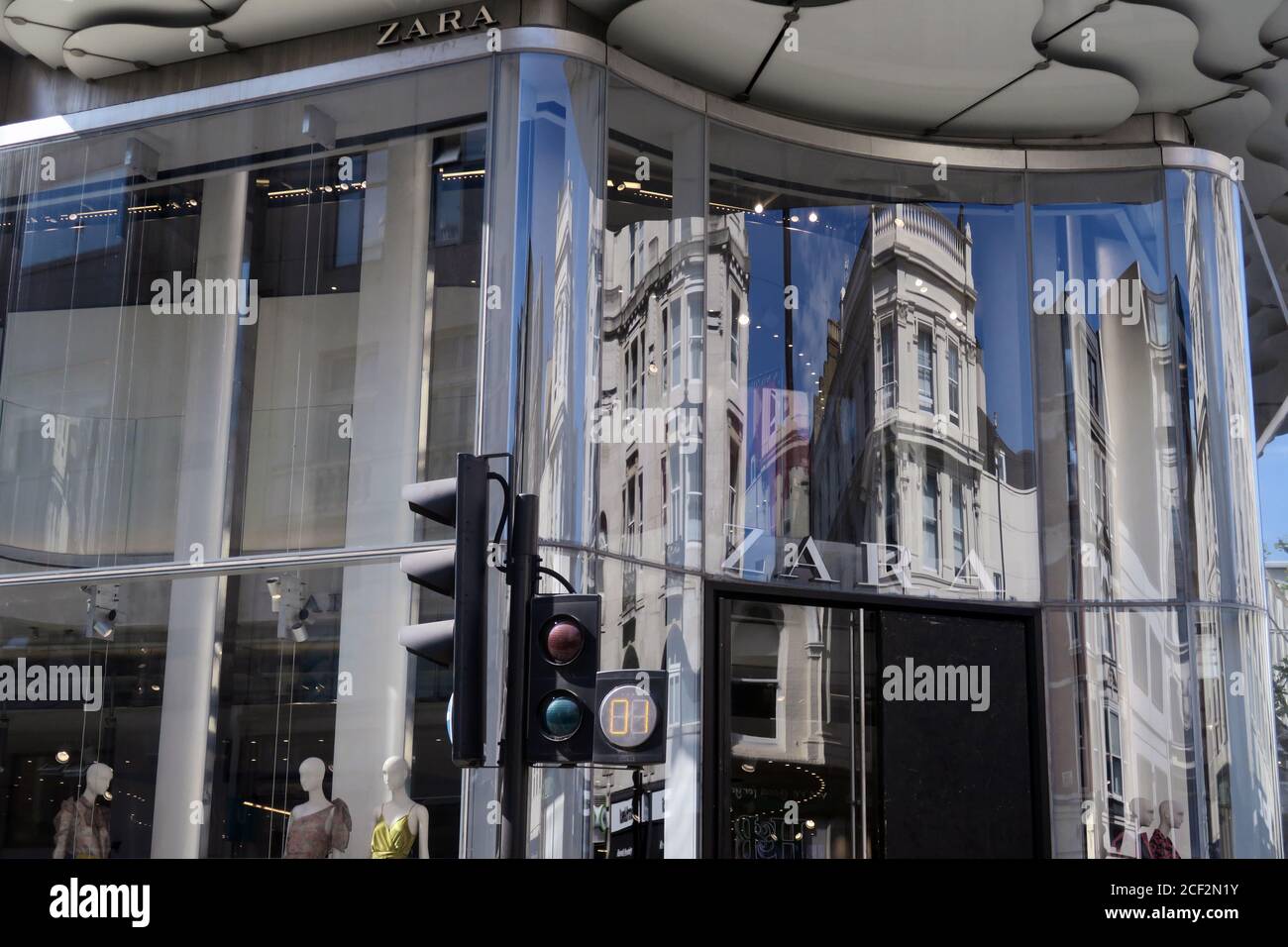 Reflections in a store window of Oxford Street buildings Stock Photo ...