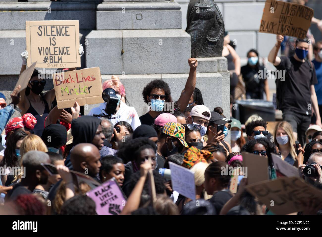 Protesters holding signs at a Black Lives Matter protest in Trafalgar ...