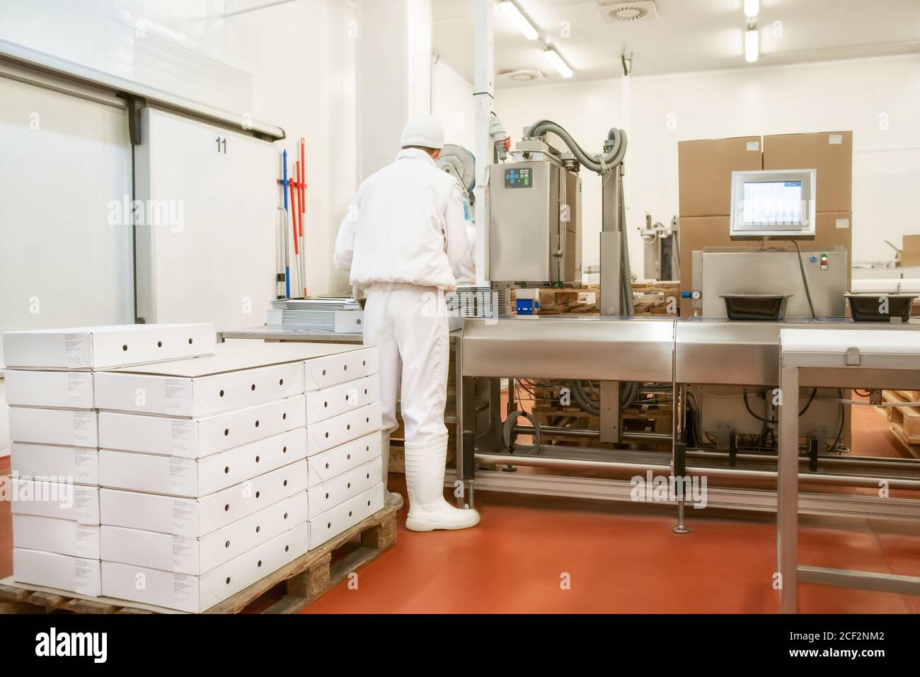 Production line boxes hi-res stock photography and images - Alamy