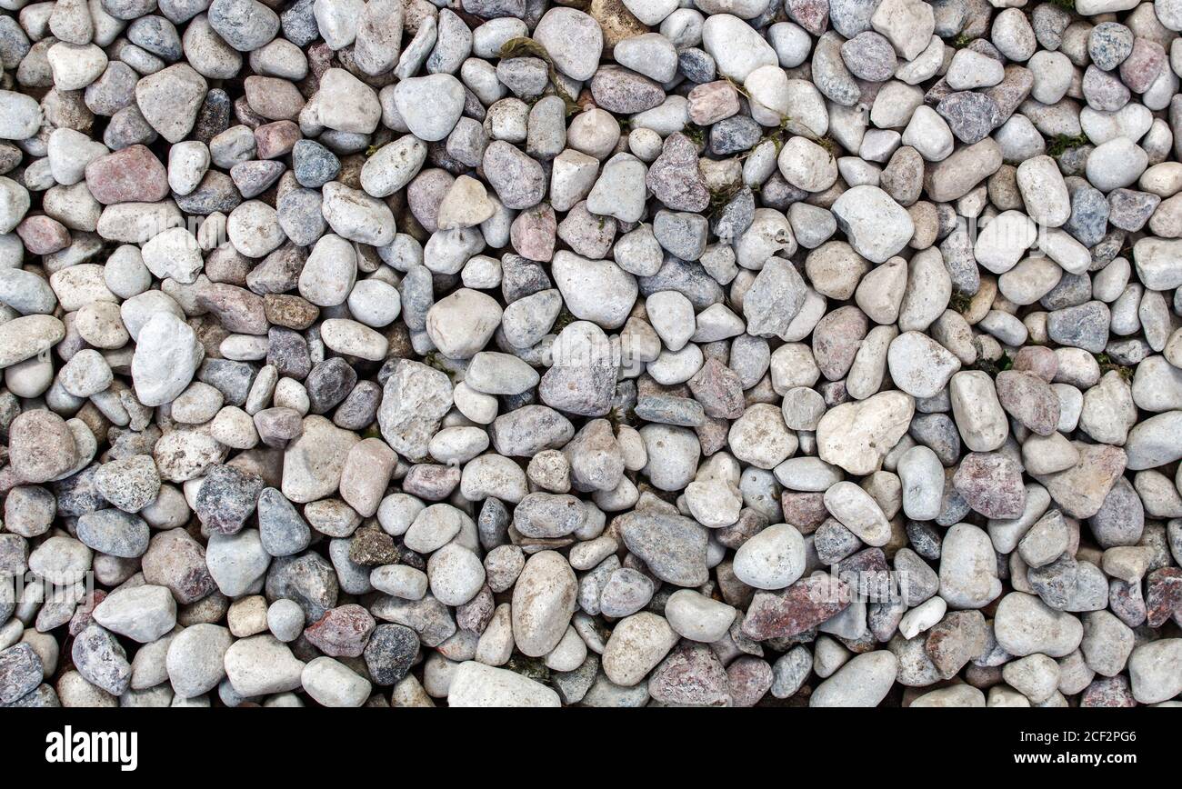 small stones of different sizes and colors. ideal as nature background ...