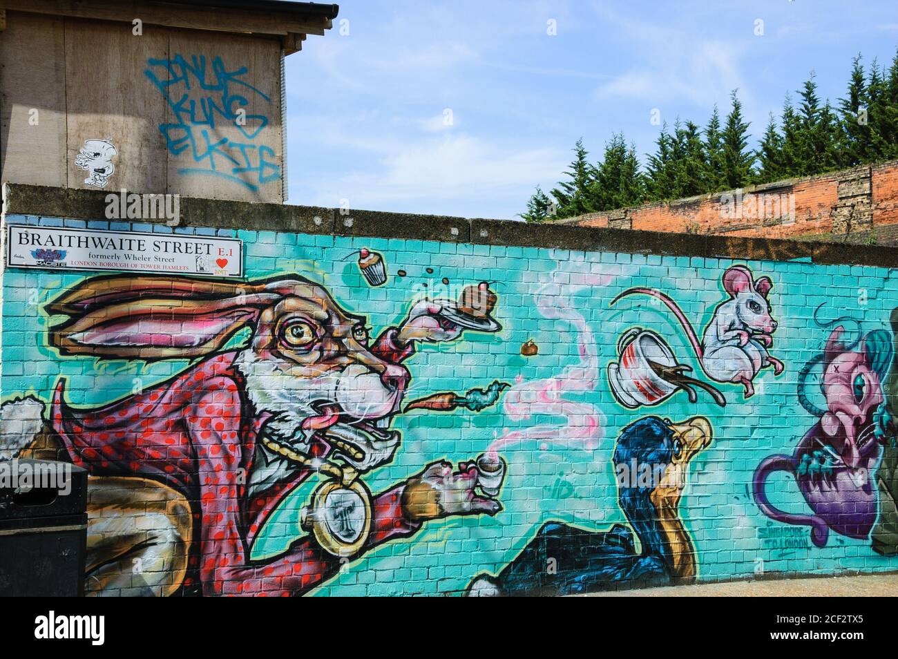 LONDON, ENGLAND, UK - MAY 4, 2014: Graffiti illustration for Alice in ...