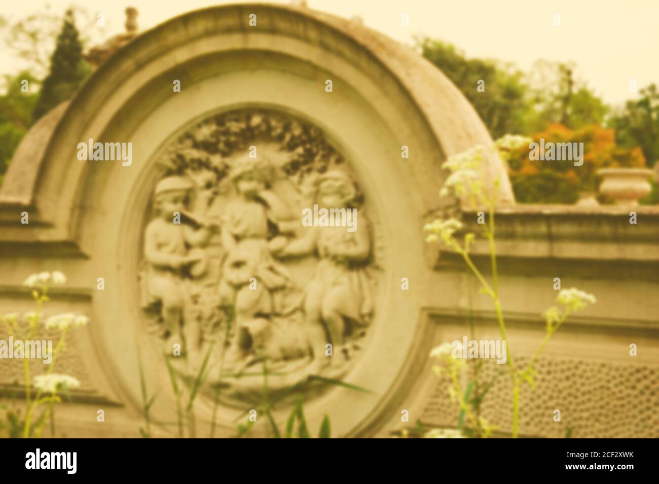 Blurred toned photo of park sculpture in London. Idyllic scene on bas ...