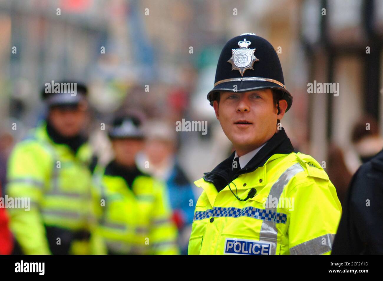 Yellow jacket policeman hi-res stock photography and images - Alamy