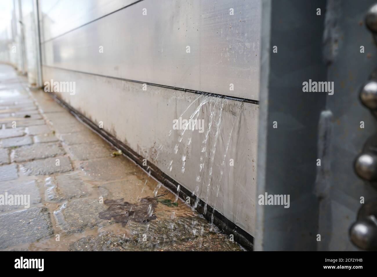 Leaking flood protection barrier, Bewdley floods, UK, February 2020 ...