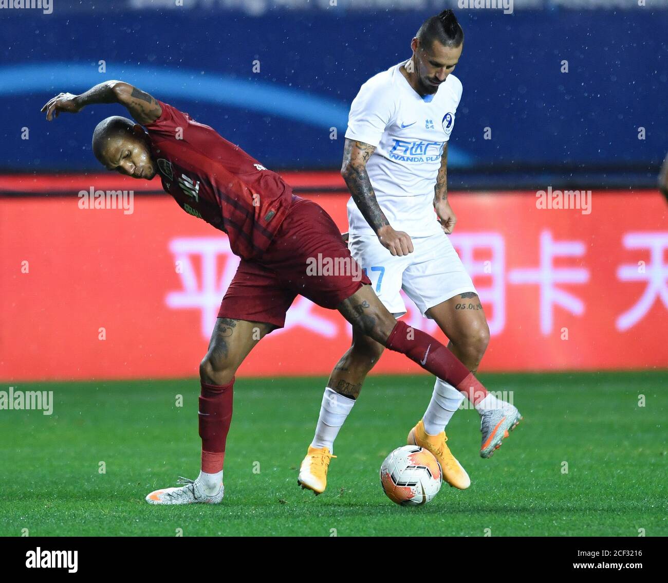 Dalian, China's Liaoning Province. 3rd Sep, 2020. Fernando Karanga (L ...