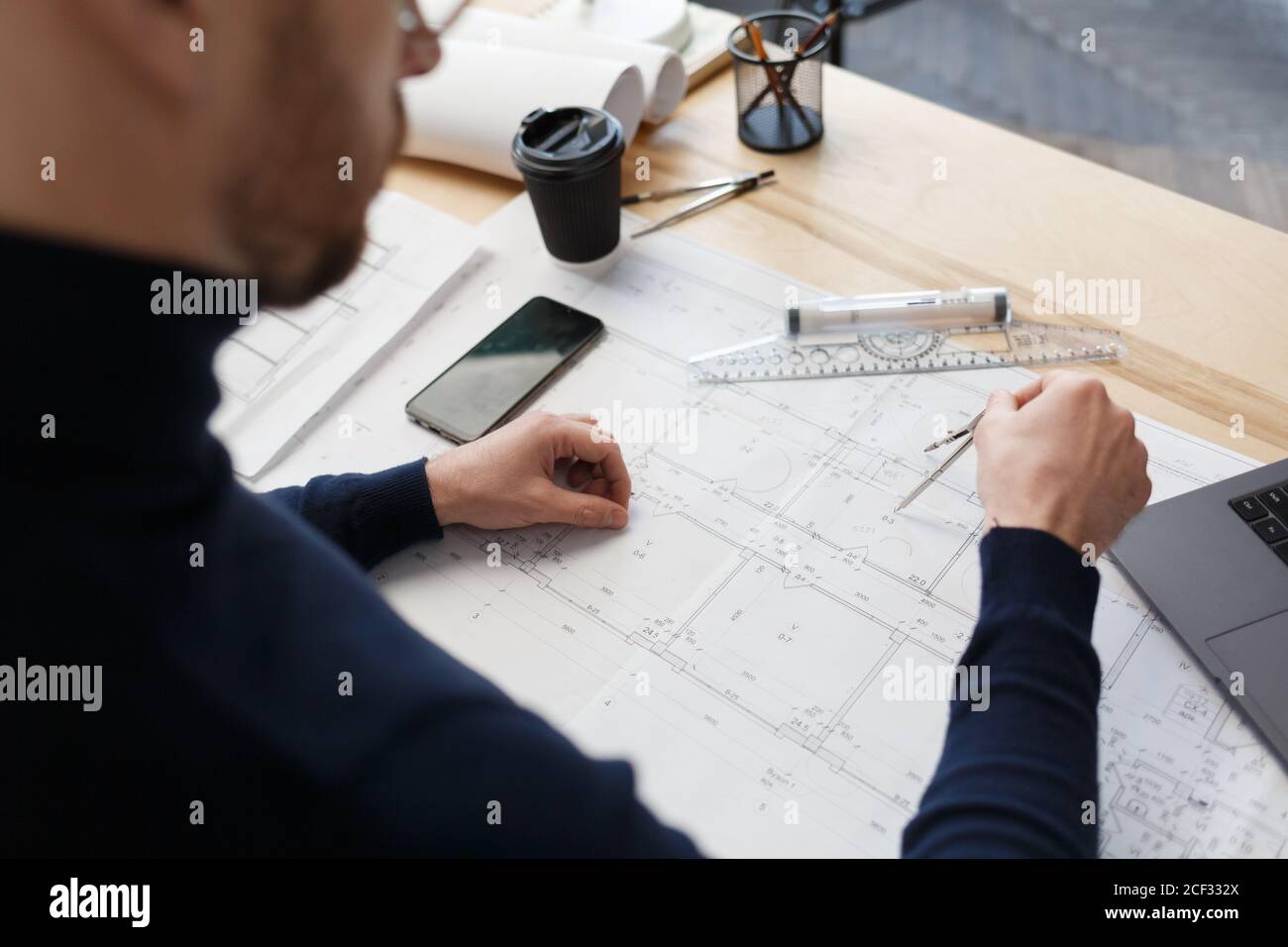 Architect Working In Office With Blueprintsengineer Inspect Architectural Plan Sketching A