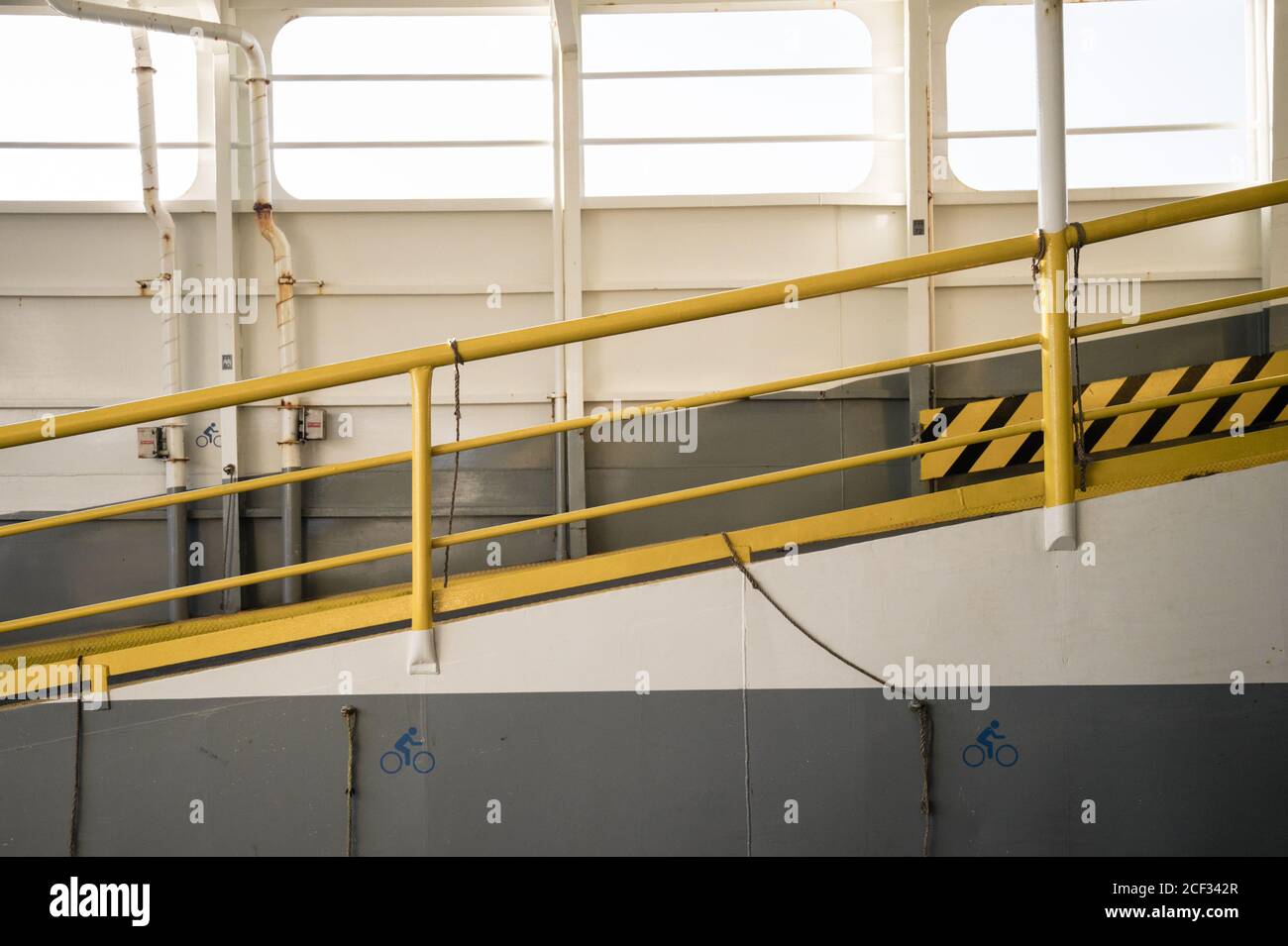 Yellow hand rail on ferry boat ramp Stock Photo - Alamy