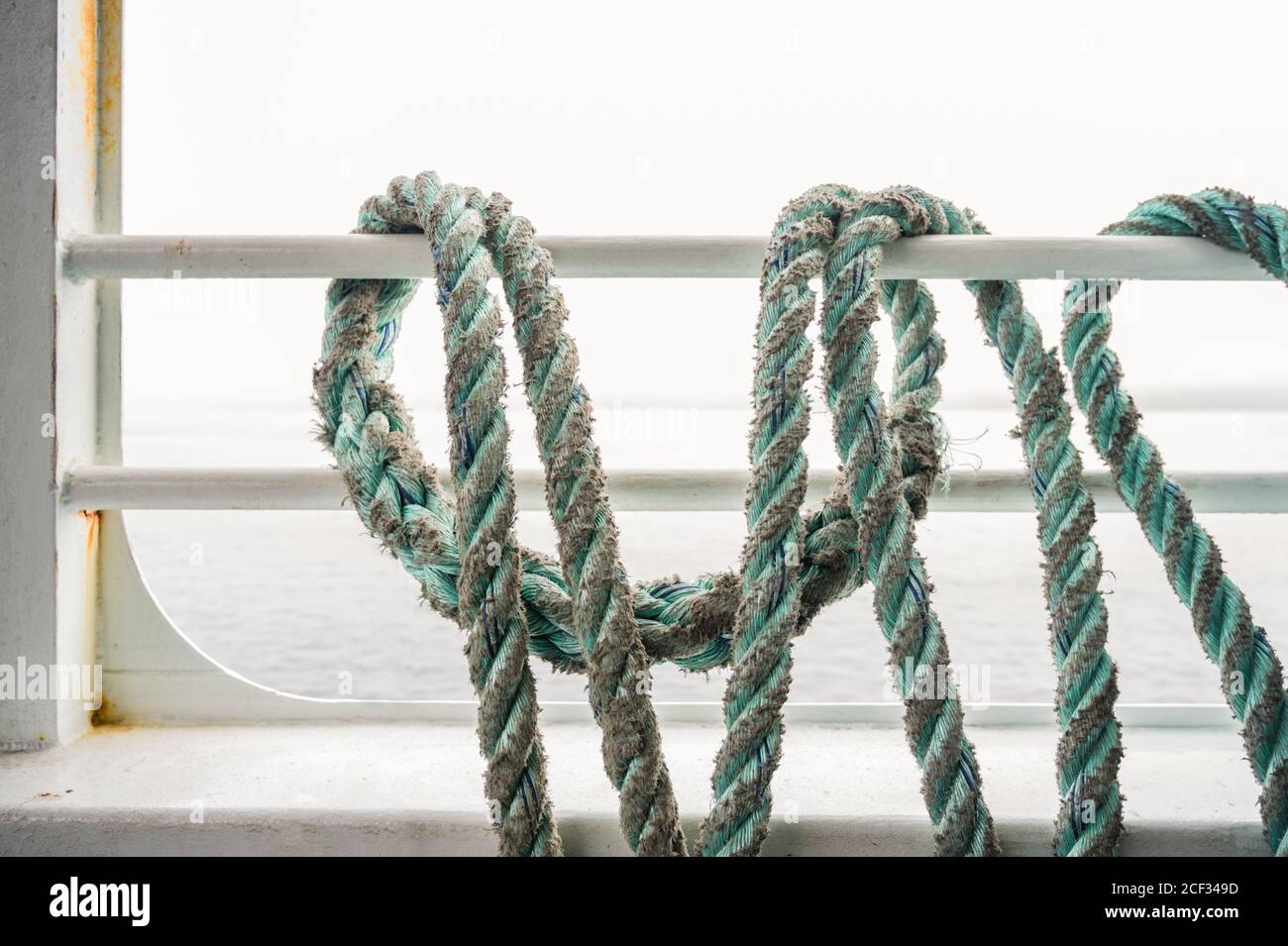 Light Blue Ropes Wrapped Around Ferry Boat Railing Stock Photo - Alamy
