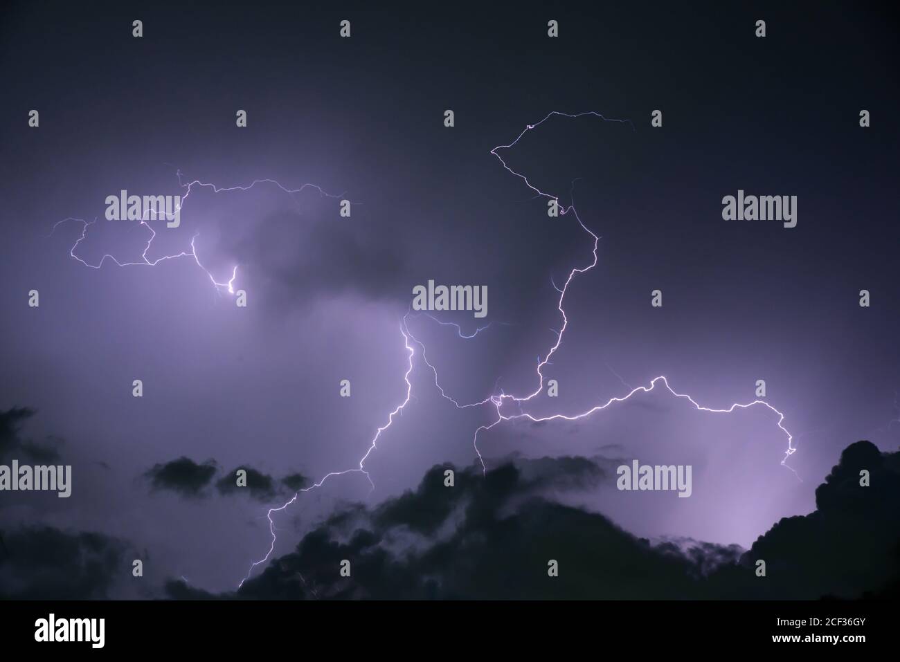 Dark cloud storm with thunder before raining Stock Photo - Alamy
