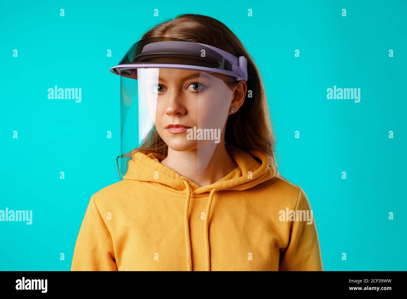 Portrait young woman face shield hi-res stock photography and images ...