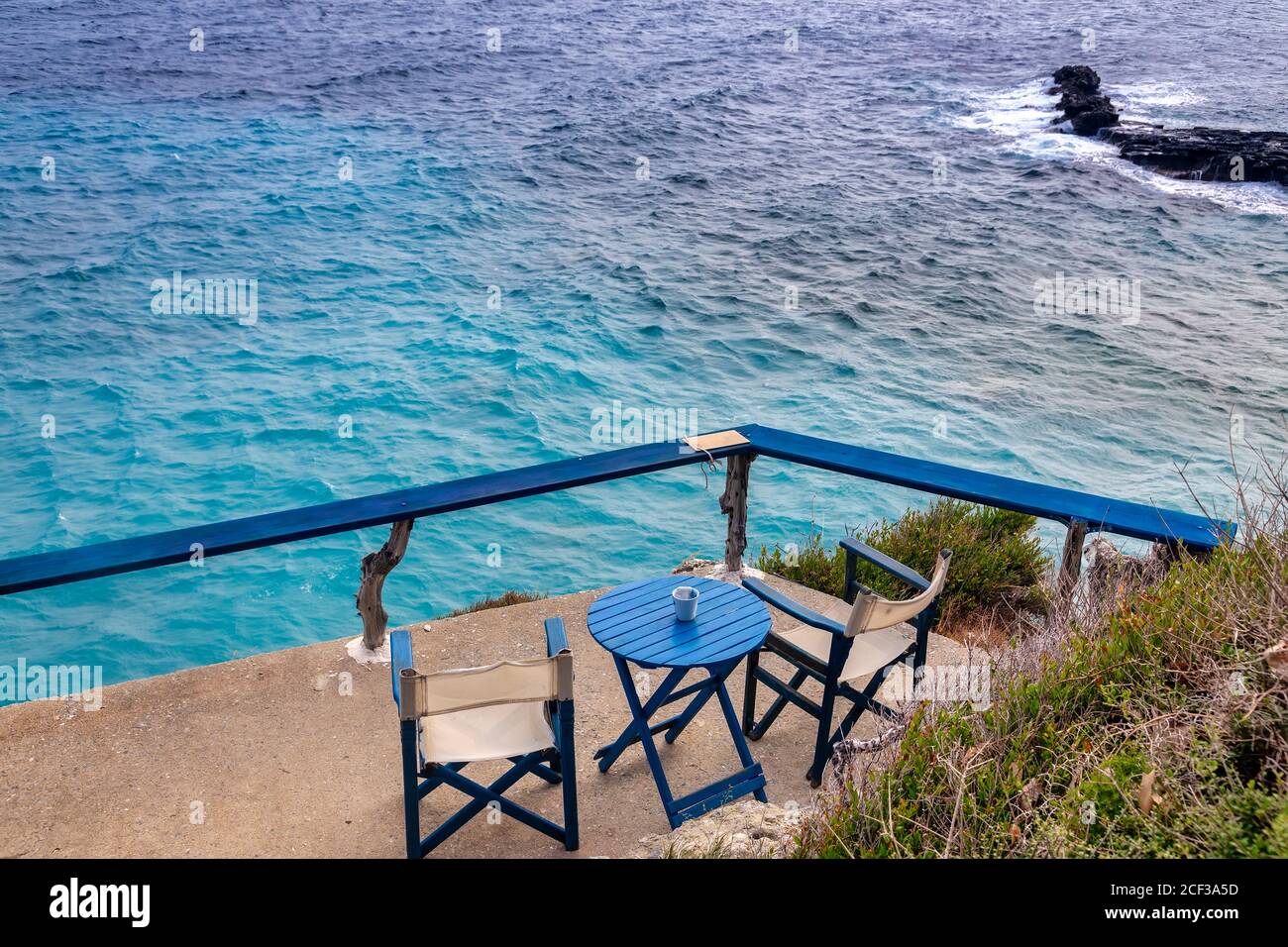 Traditional greek cafe in pelion. cafe near seaside. table and chair ...