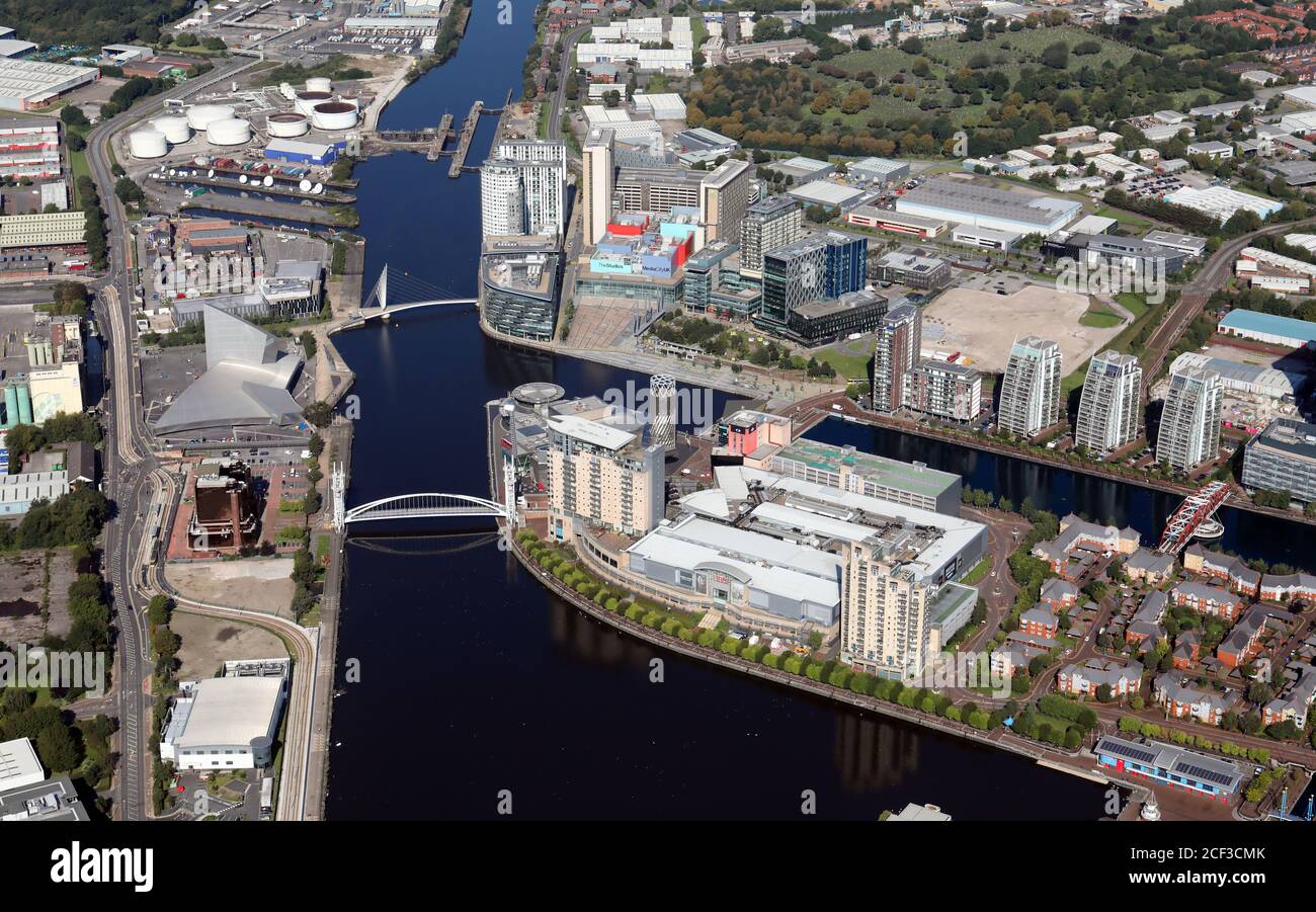 aerial view of Salford Quays, including MediaCityUK, Lowry Centre and ...