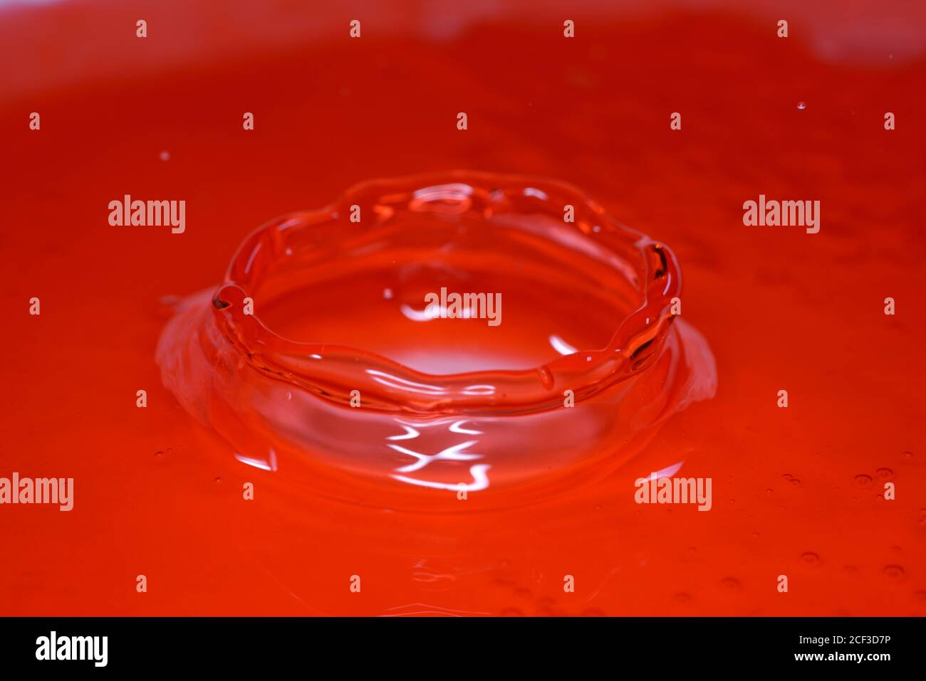 Water drops photographed with highspeed flashes and dropper in the ...