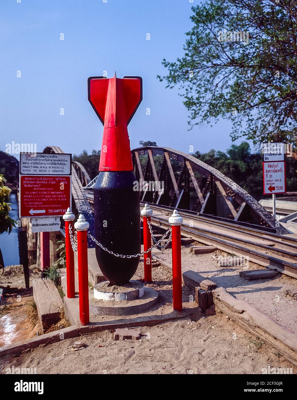 Thailand, Kanchanaburi. Unexploded bombs guard the entrance at the ...
