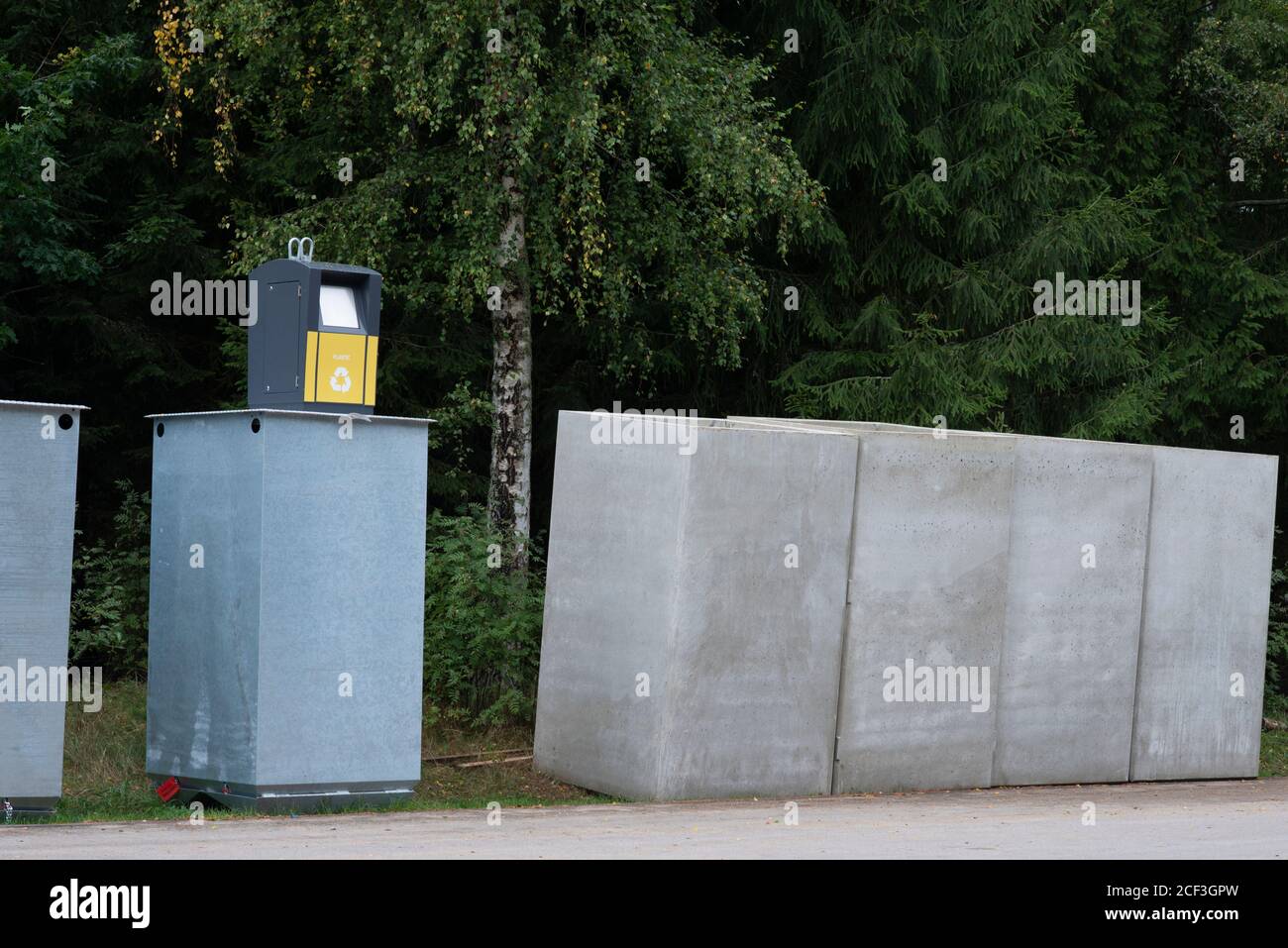 New underground garbage recycling containers waiting to be installed ...