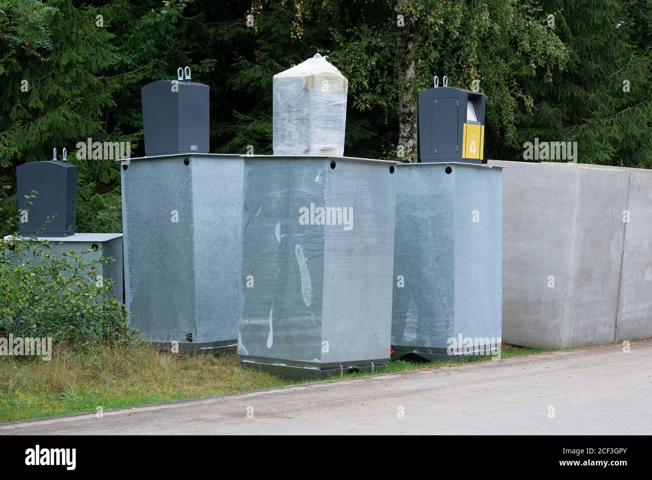 New underground garbage recycling containers waiting to be installed ...