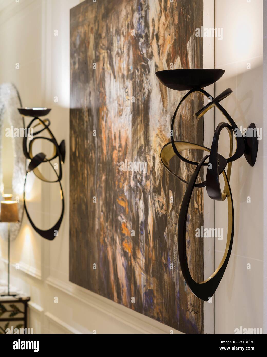 Painting between matching lights Stock Photo - Alamy