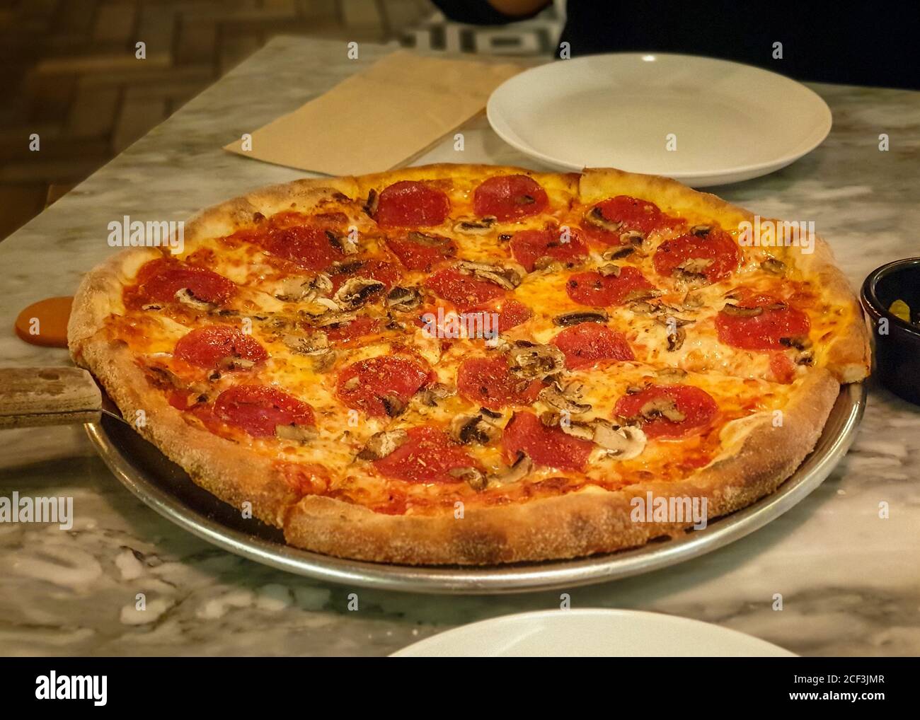 Pepperoni pizza - A popular pizza topping in American pizzerias ...