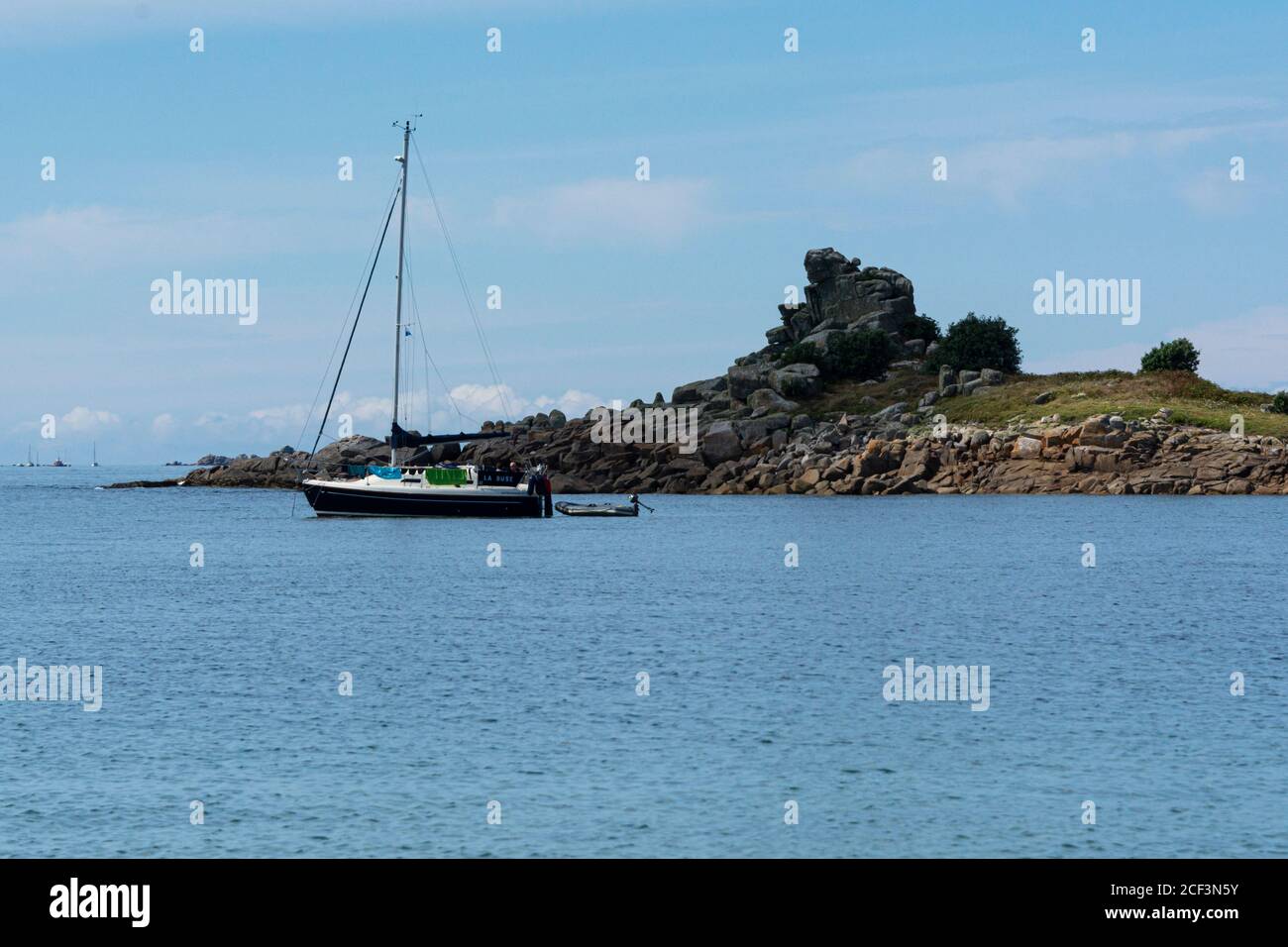 A boat at anchor near Taylor's Island off Porthloo Beach, St Mary's ...