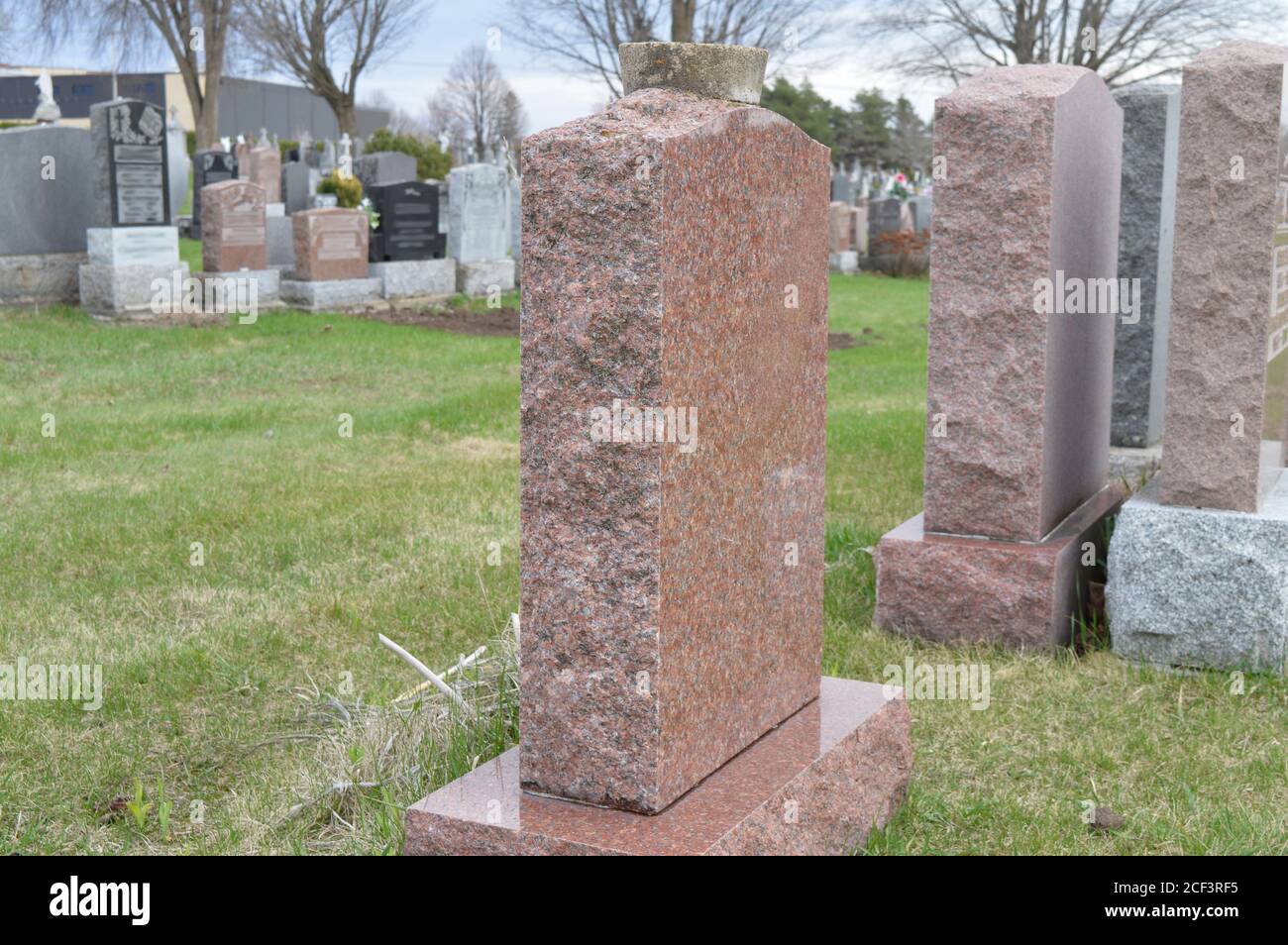 Tomb stones or gravestones sit as the final resting place of the dead ...