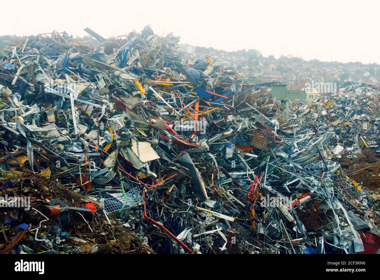 Piles of scrap metal for recycling in an open-air warehouse. Collection ...