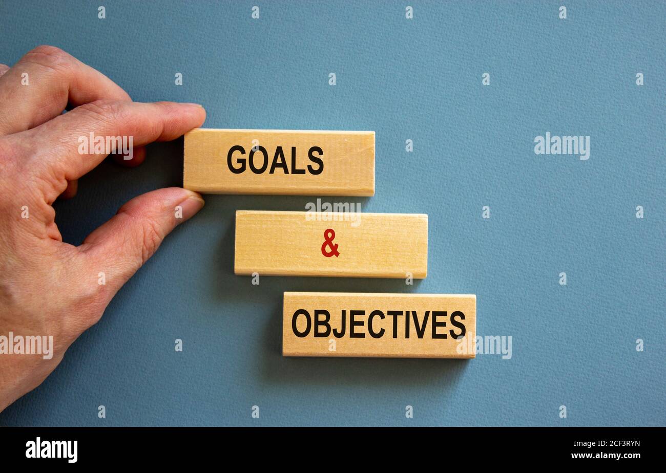 Concept text 'goals and objectives' on wooden blocks on a beautiful ...