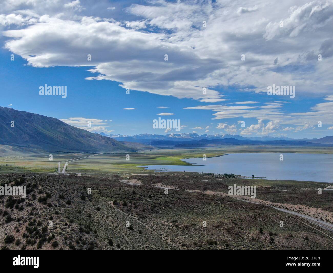 Aerial view of Lake Crowley over the mountain during hot summer day ...