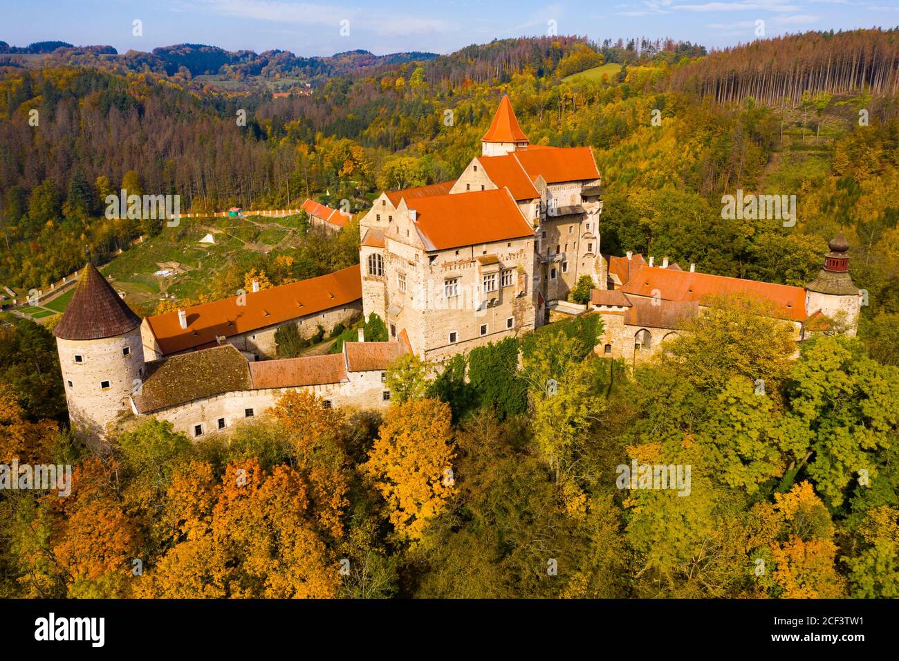 Scenic aerial view of impressive medieval Pernstejn castle on sunny ...