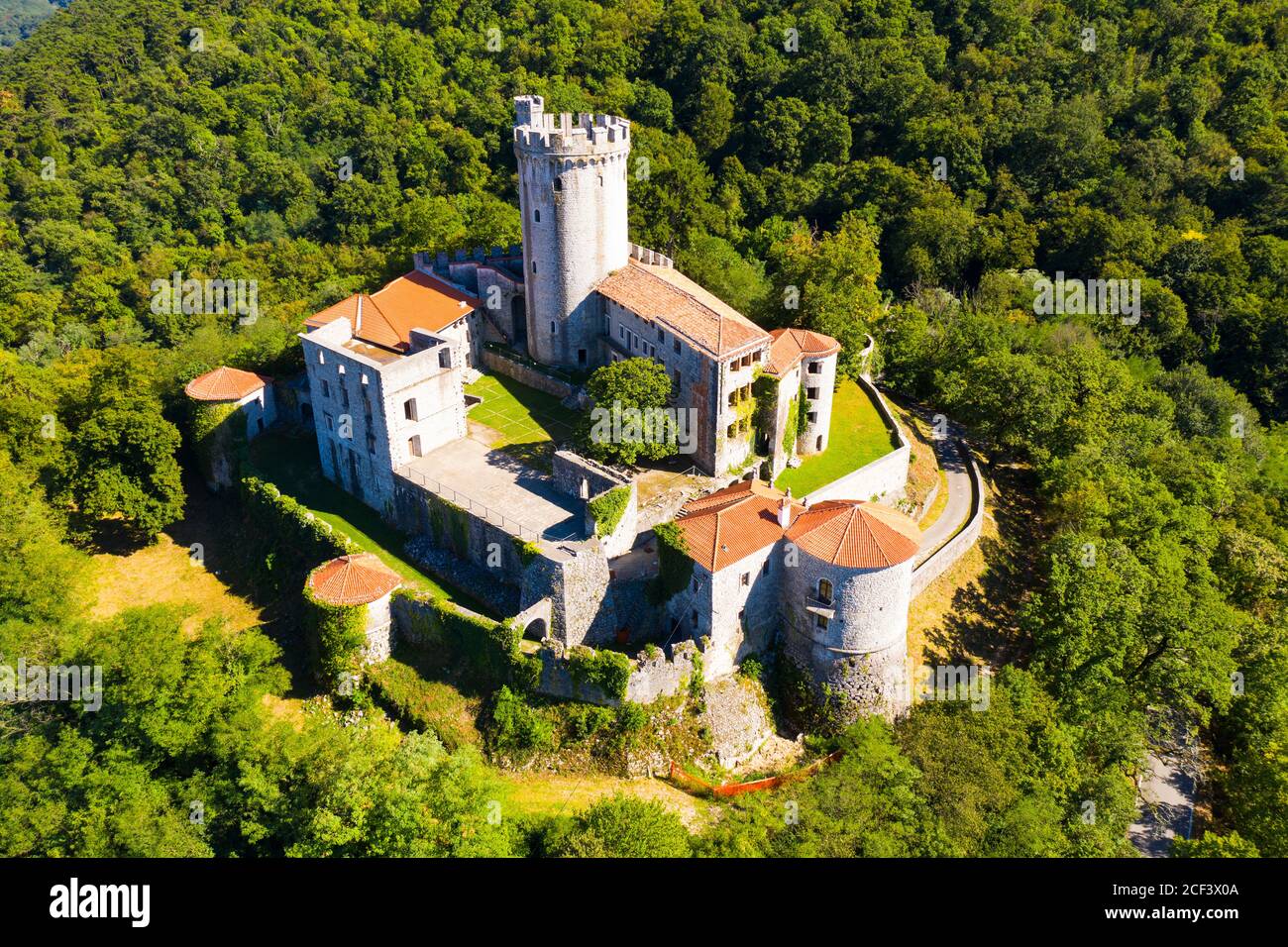 Picturesque autumn landscape with imposing medieval Rihemberk Castle on ...