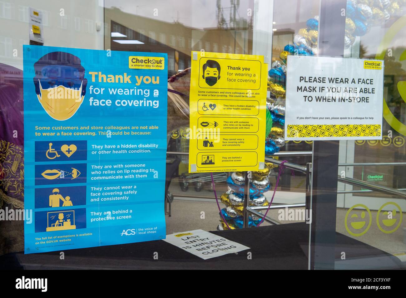 Slough, Berkshire, UK. 3rd September, 2020. Face covering notices in ...
